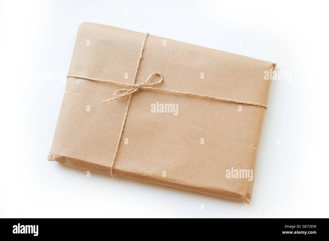 envelope kraft paper tied with string on a white background Stock Photo ...