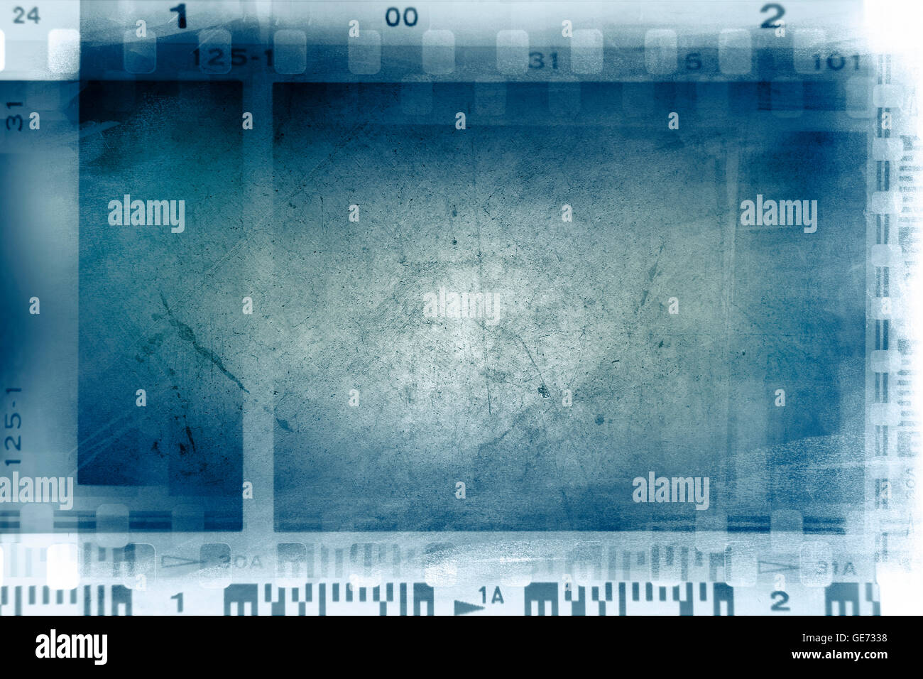 Film negative frames on blue background Stock Photo - Alamy