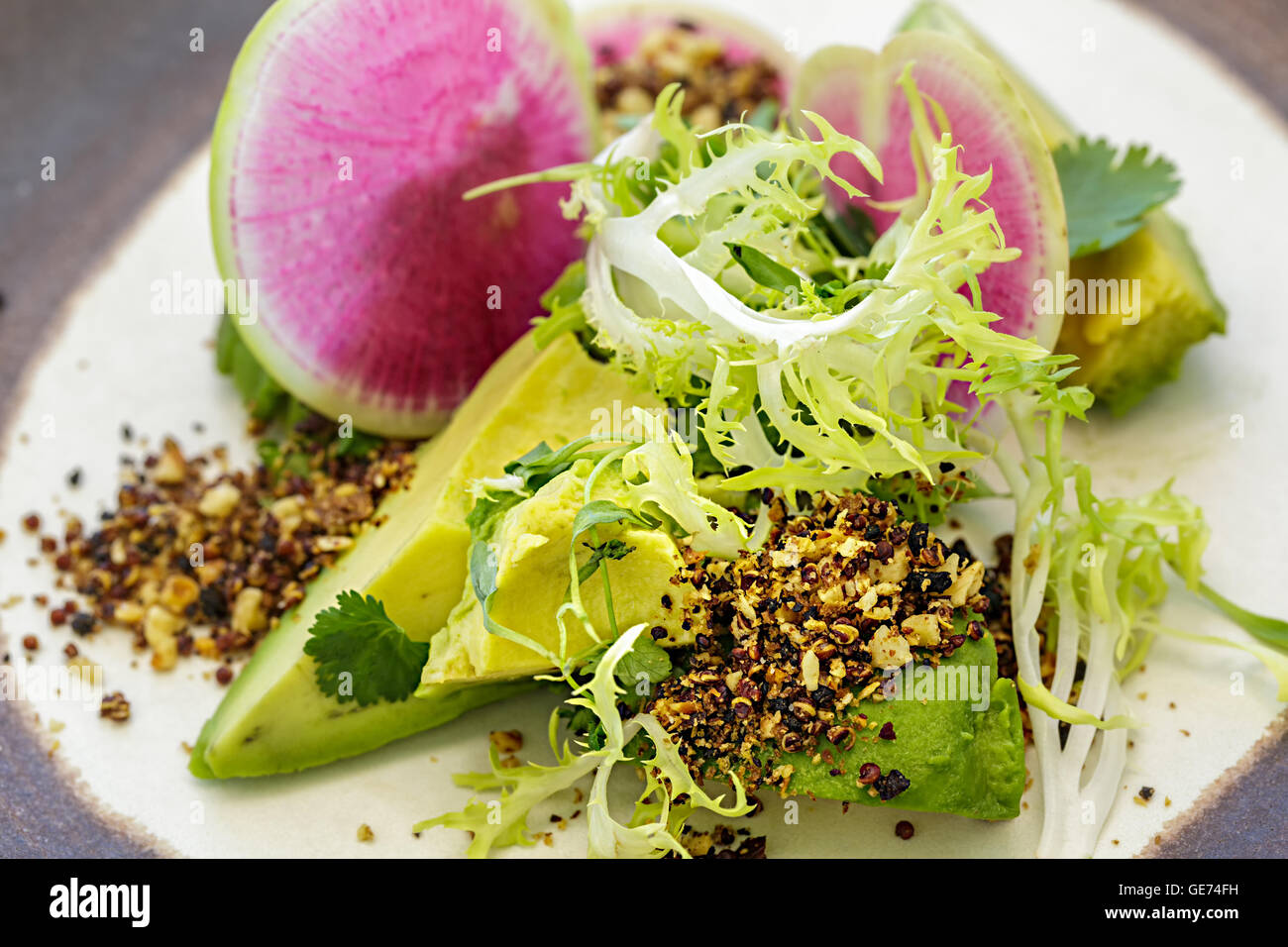 Chilled avocado with rainbow radish, frisee greens, scallions and ...