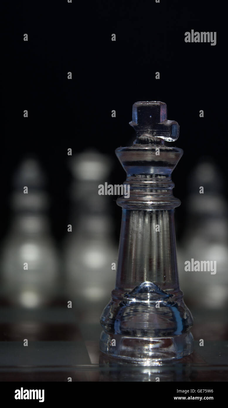 Chess: Damaged king fighting alone Stock Photo - Alamy