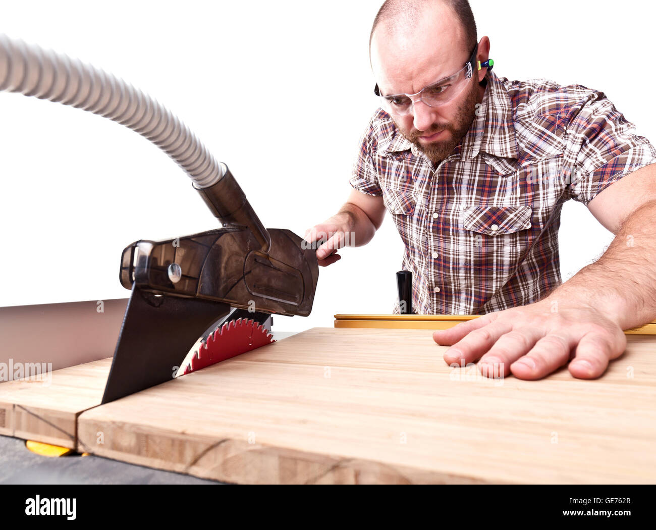 carpenter work with table saw isolated on white background Stock Photo ...
