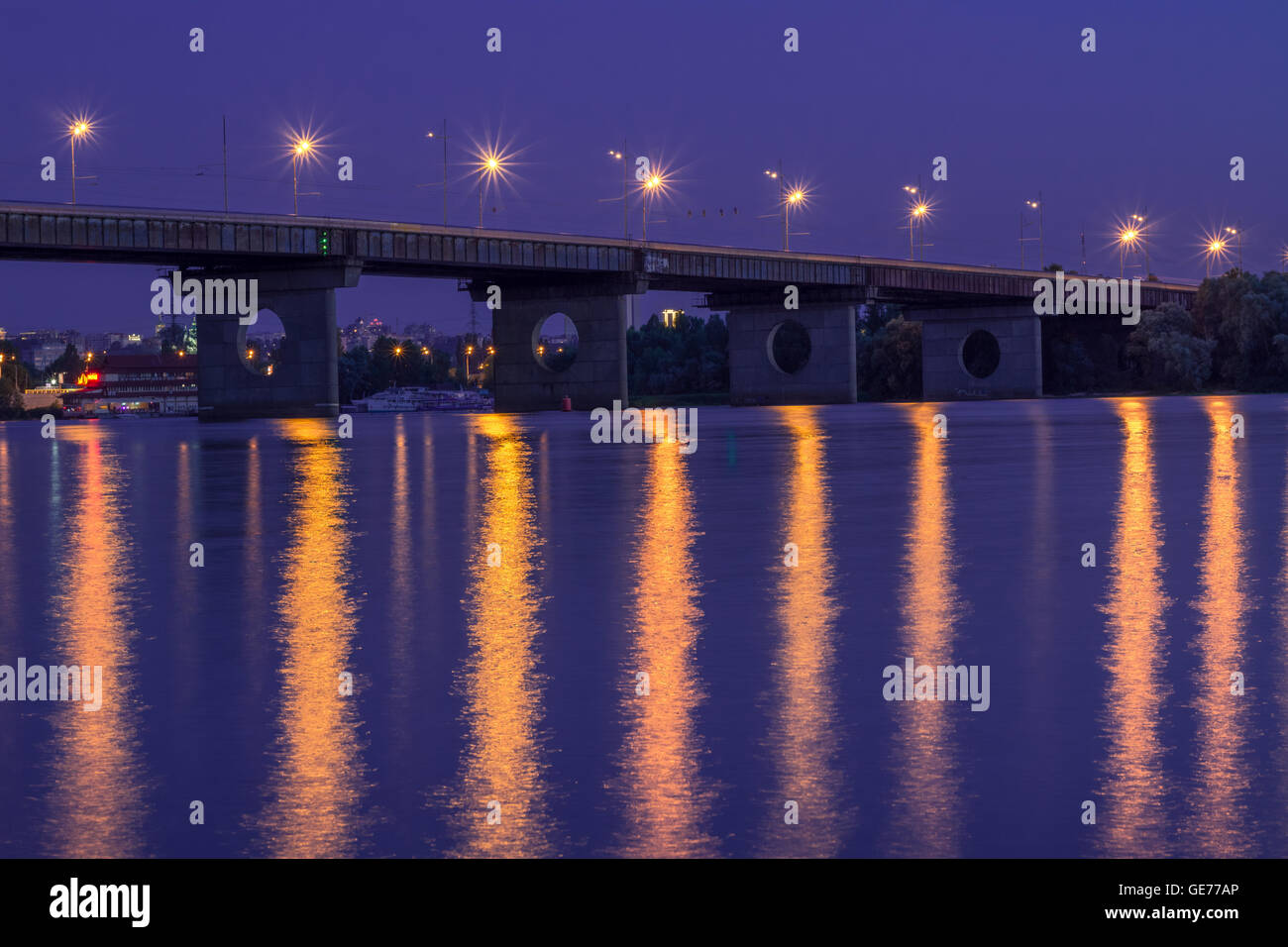 Night bridge lights reflected in river waters. HDR Stock Photo - Alamy