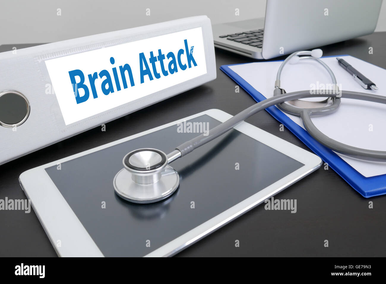 Brain Attack folder on Desktop on table. ipad Stock Photo - Alamy