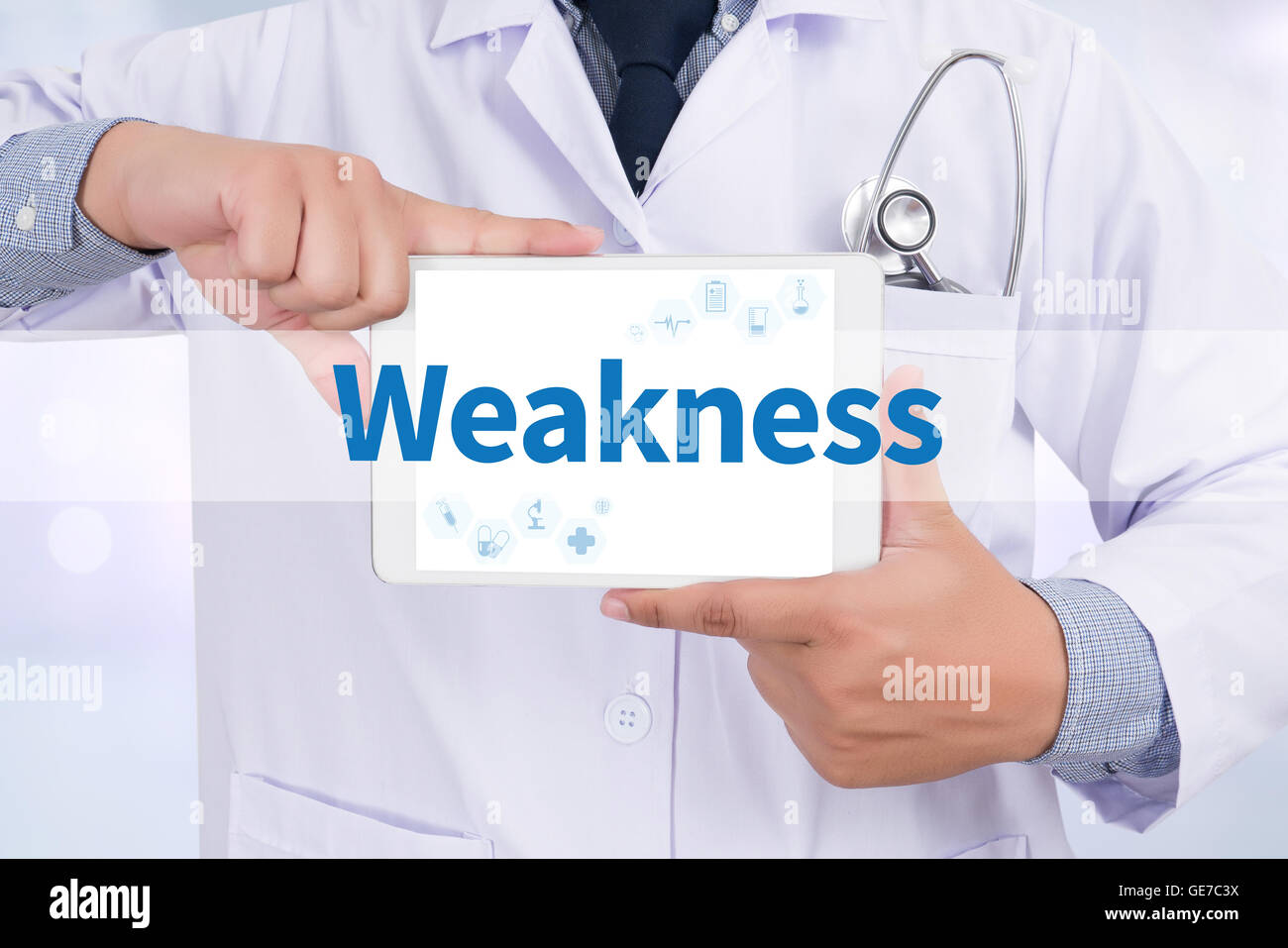 Weakness Doctor holding digital tablet Stock Photo - Alamy