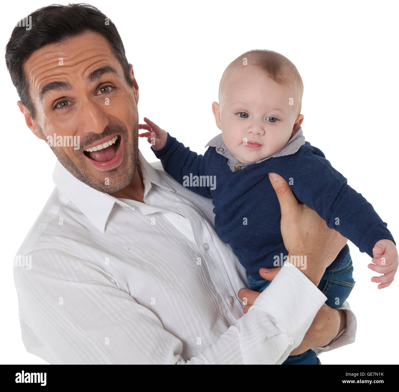 A photo of cheerful man with baby boy Happy father and son are wearing ...
