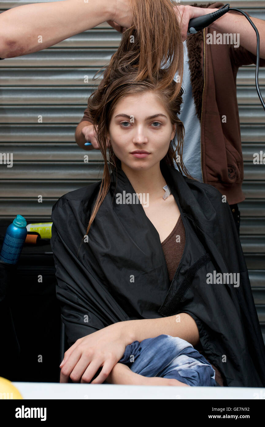 model having hair and makeup done backstage at fashionweek Stock Photo ...