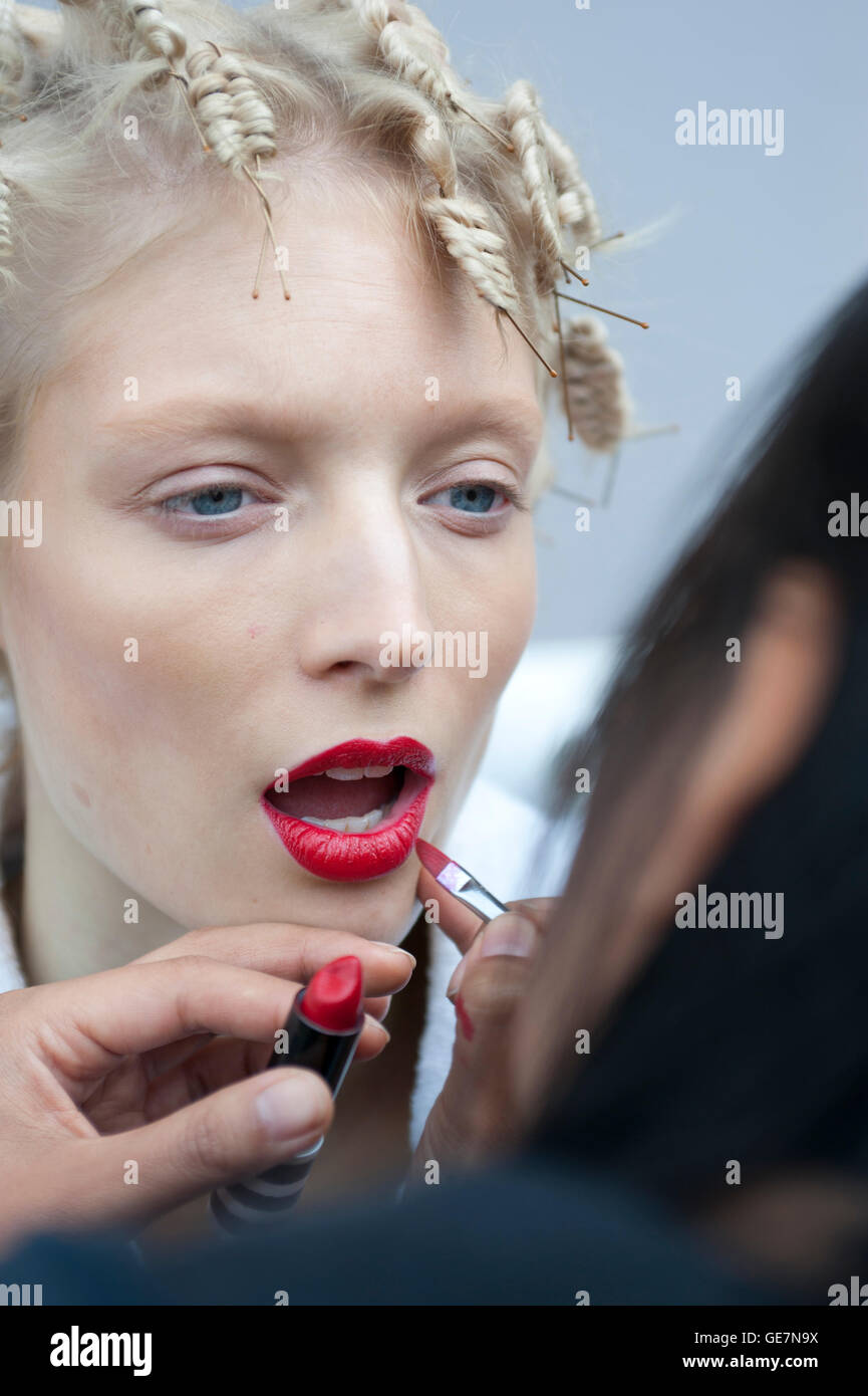 model having hair and makeup done backstage at fashionweek Stock Photo ...