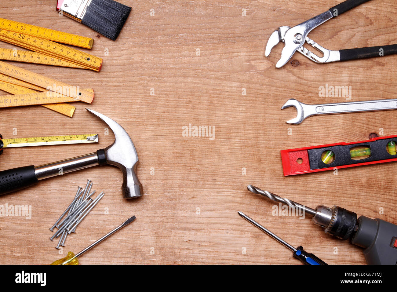 Assorted work tools on wood Stock Photo - Alamy