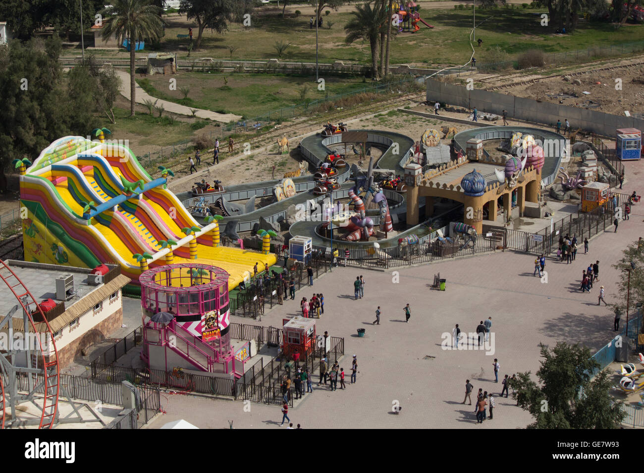 Iraqi kids riding some games in Zawraa park in Baghdad city capital of ...