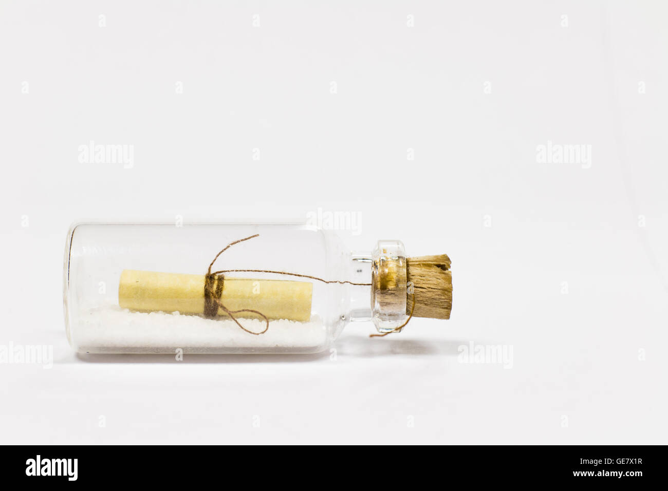 Message in bottle isolated on white background Stock Photo - Alamy