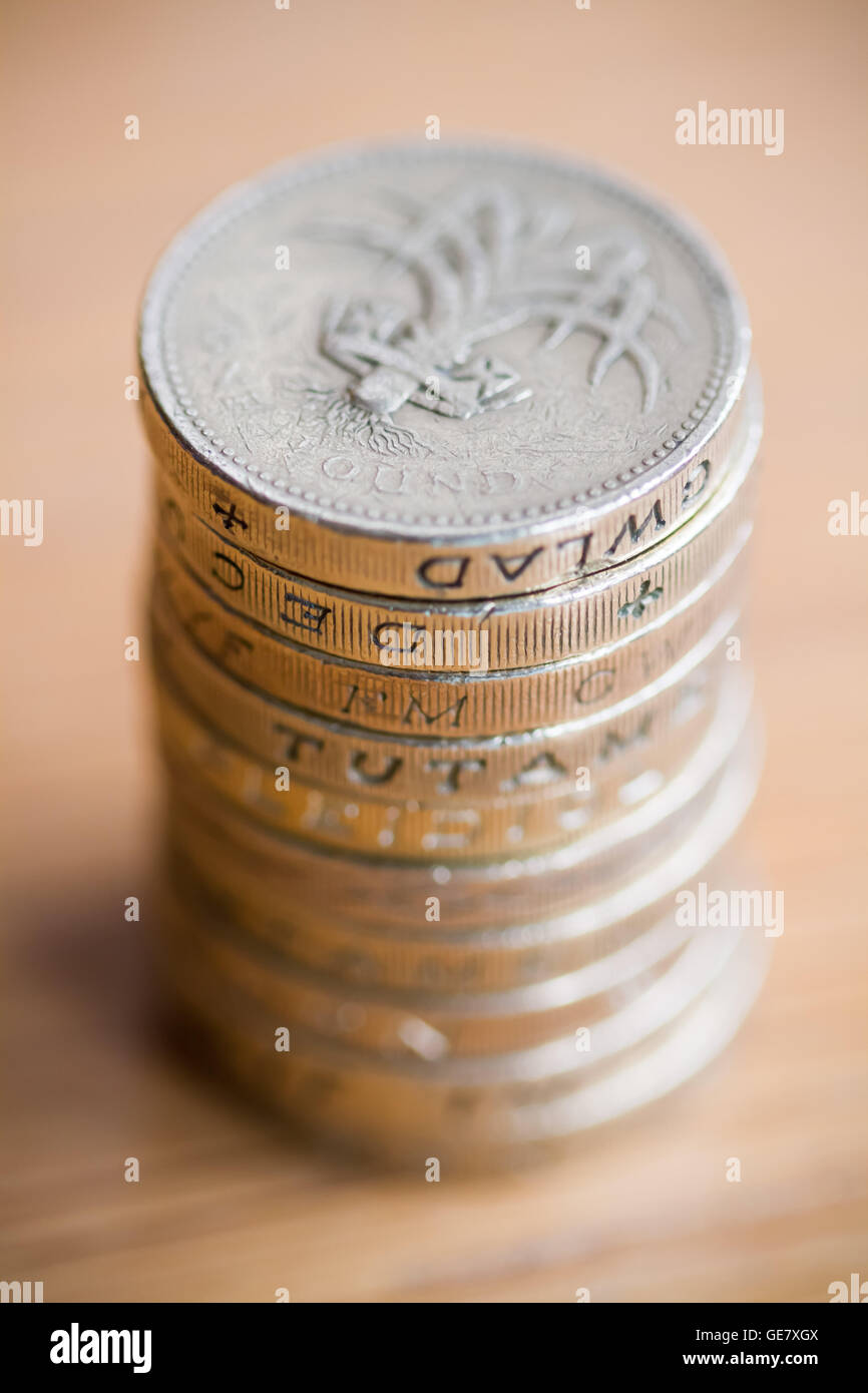 British £1 pound coins sterling currency Stock Photo - Alamy