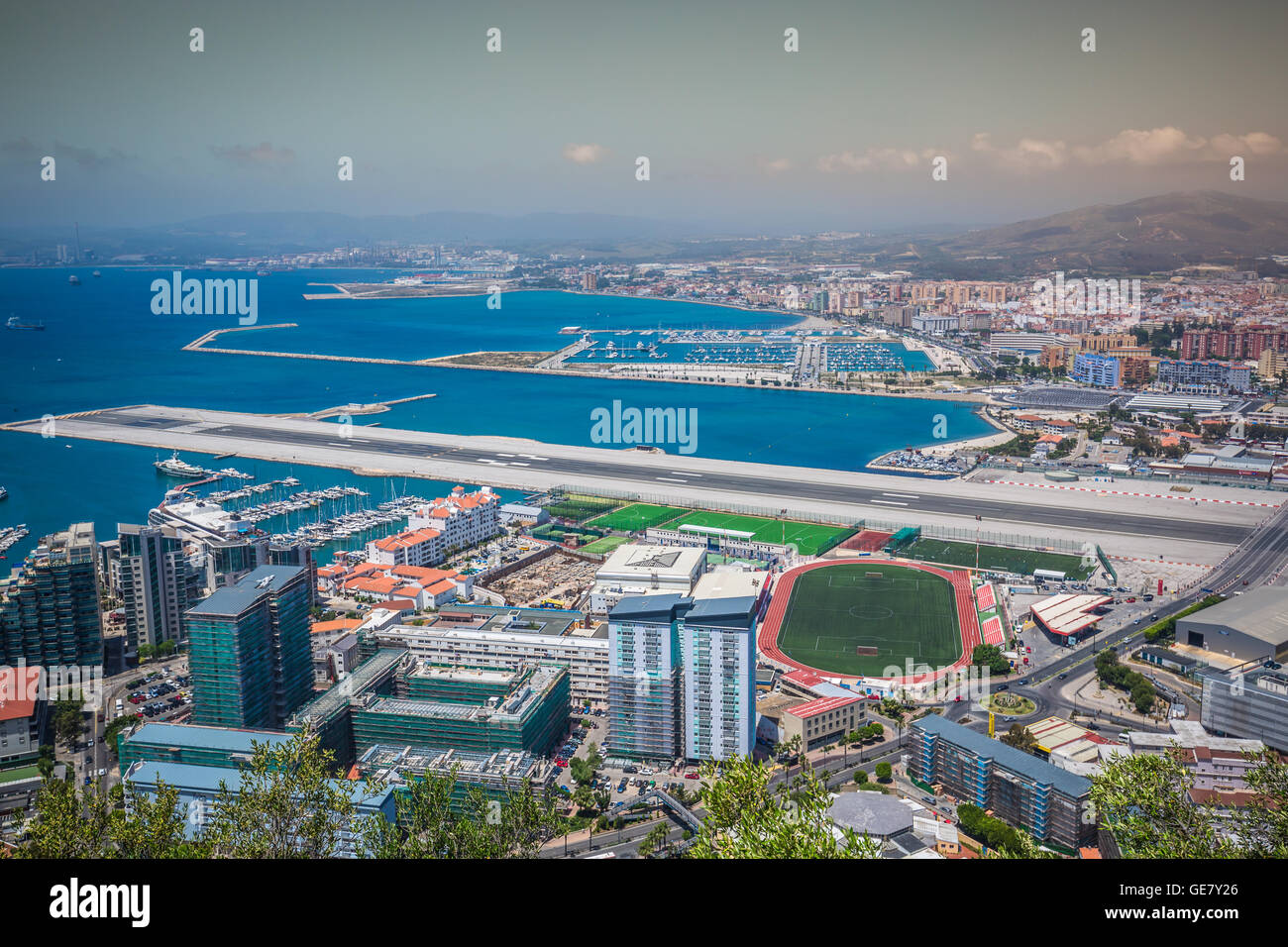 an aerial view of Gibraltar, its marina and the Mediterranean sea as ...