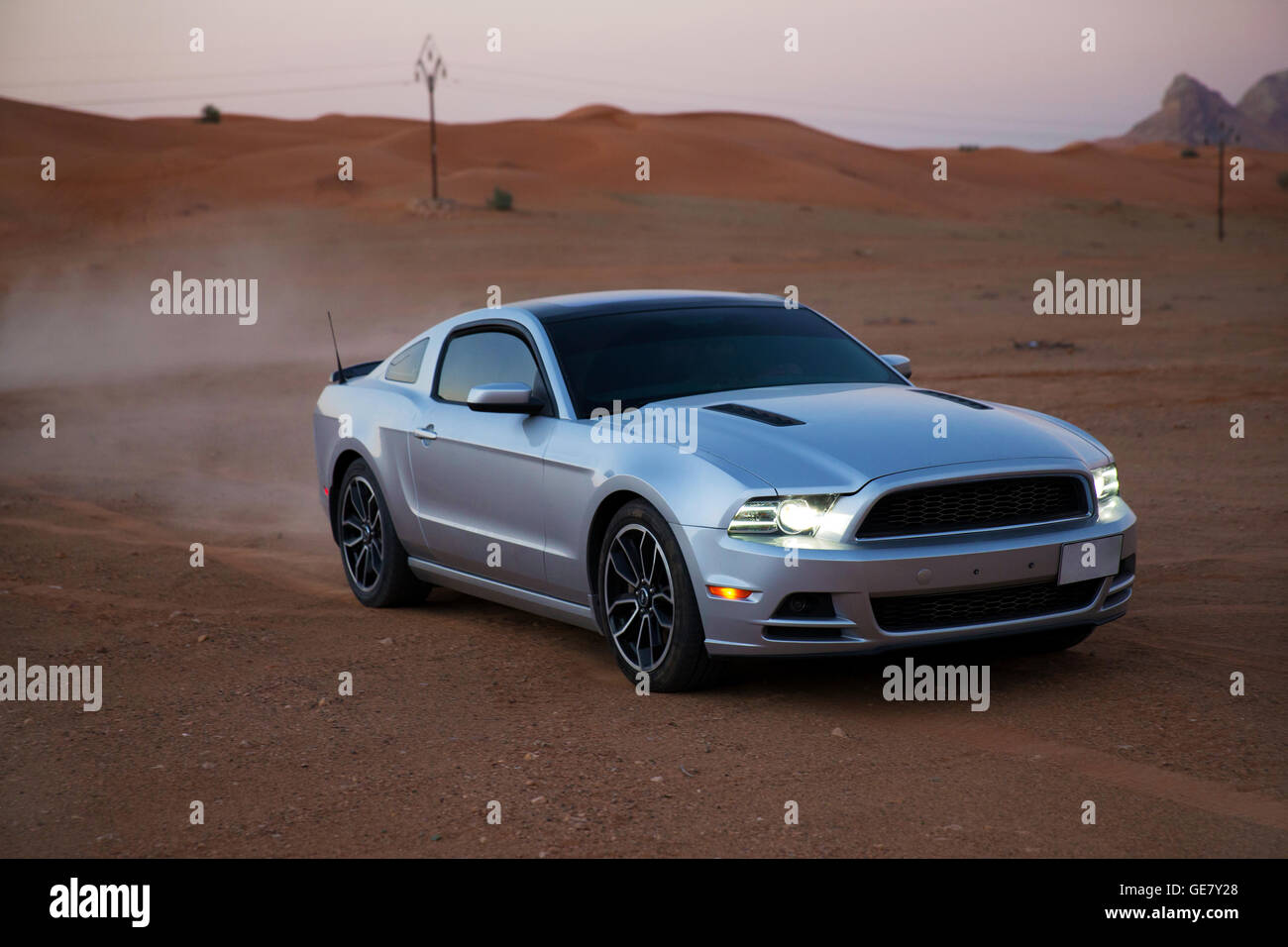 Car on desert Stock Photo - Alamy