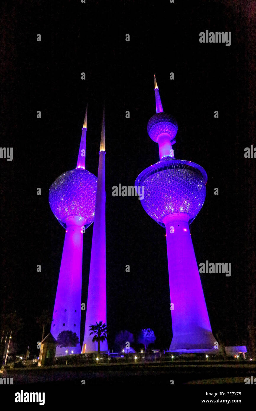 Kuwait Towers with animated graphics light at night Stock Photo - Alamy