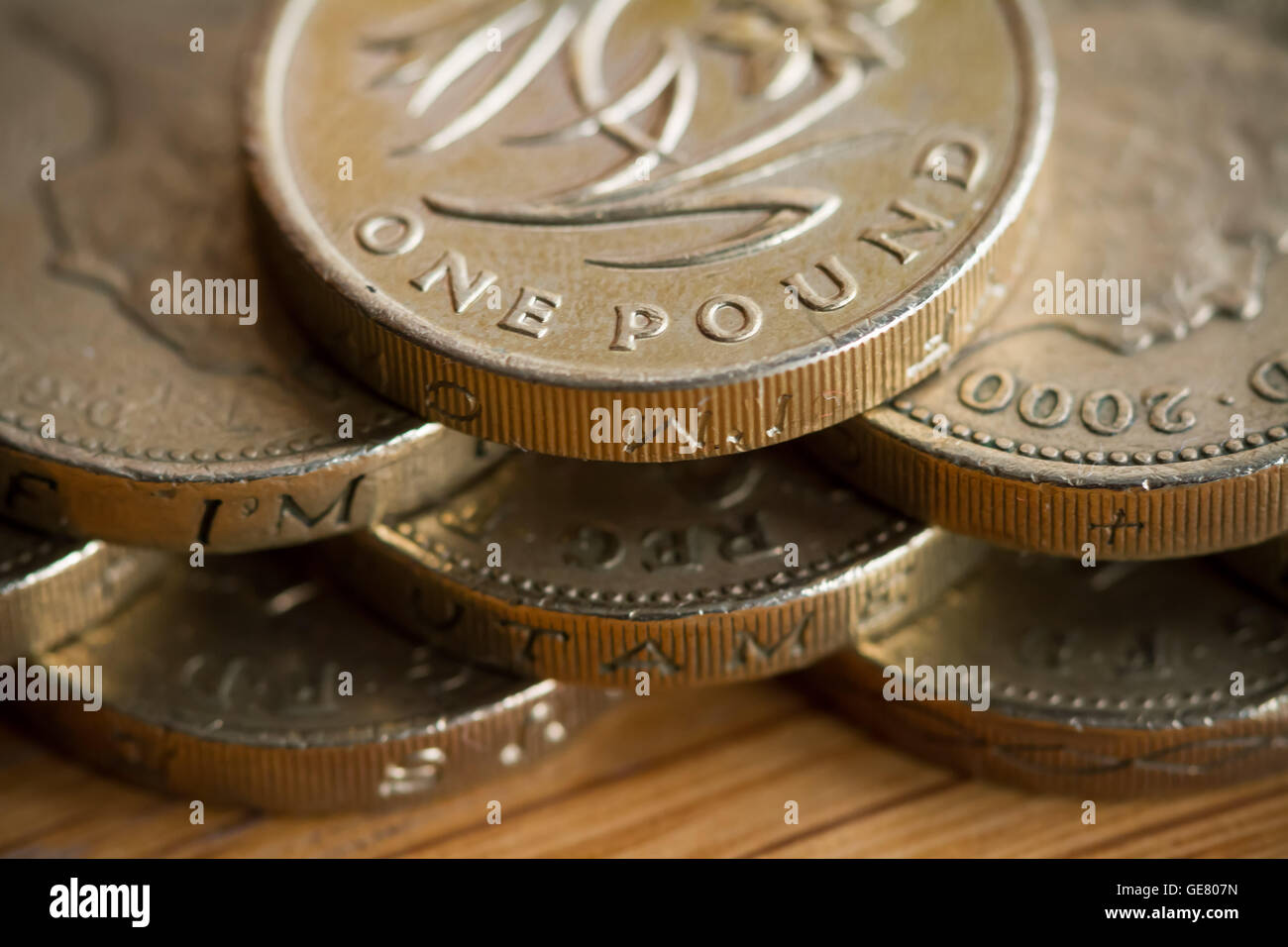 British £1 pound coins sterling currency Stock Photo - Alamy