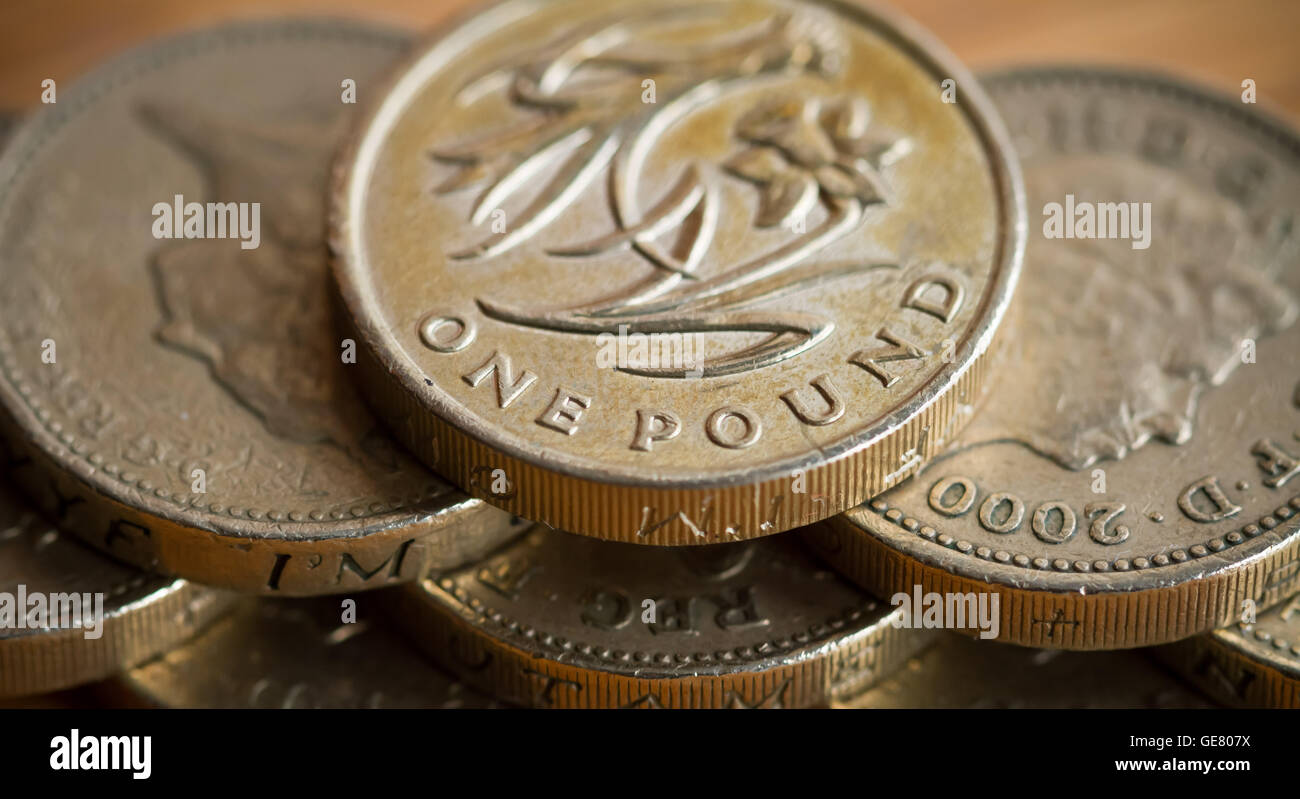 British £1 pound coins sterling currency Stock Photo - Alamy