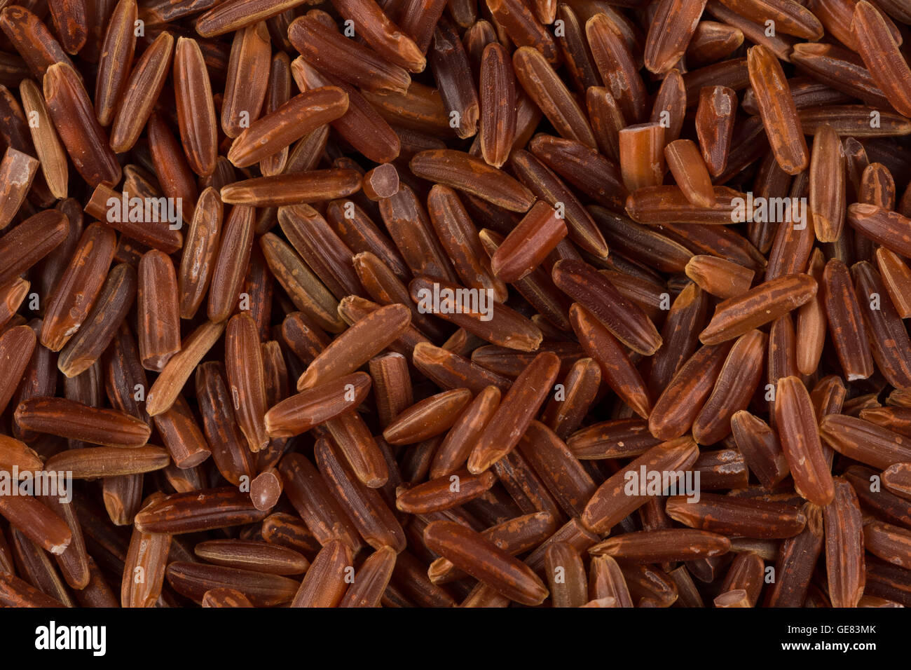 close up of background of raw red rice Stock Photo - Alamy