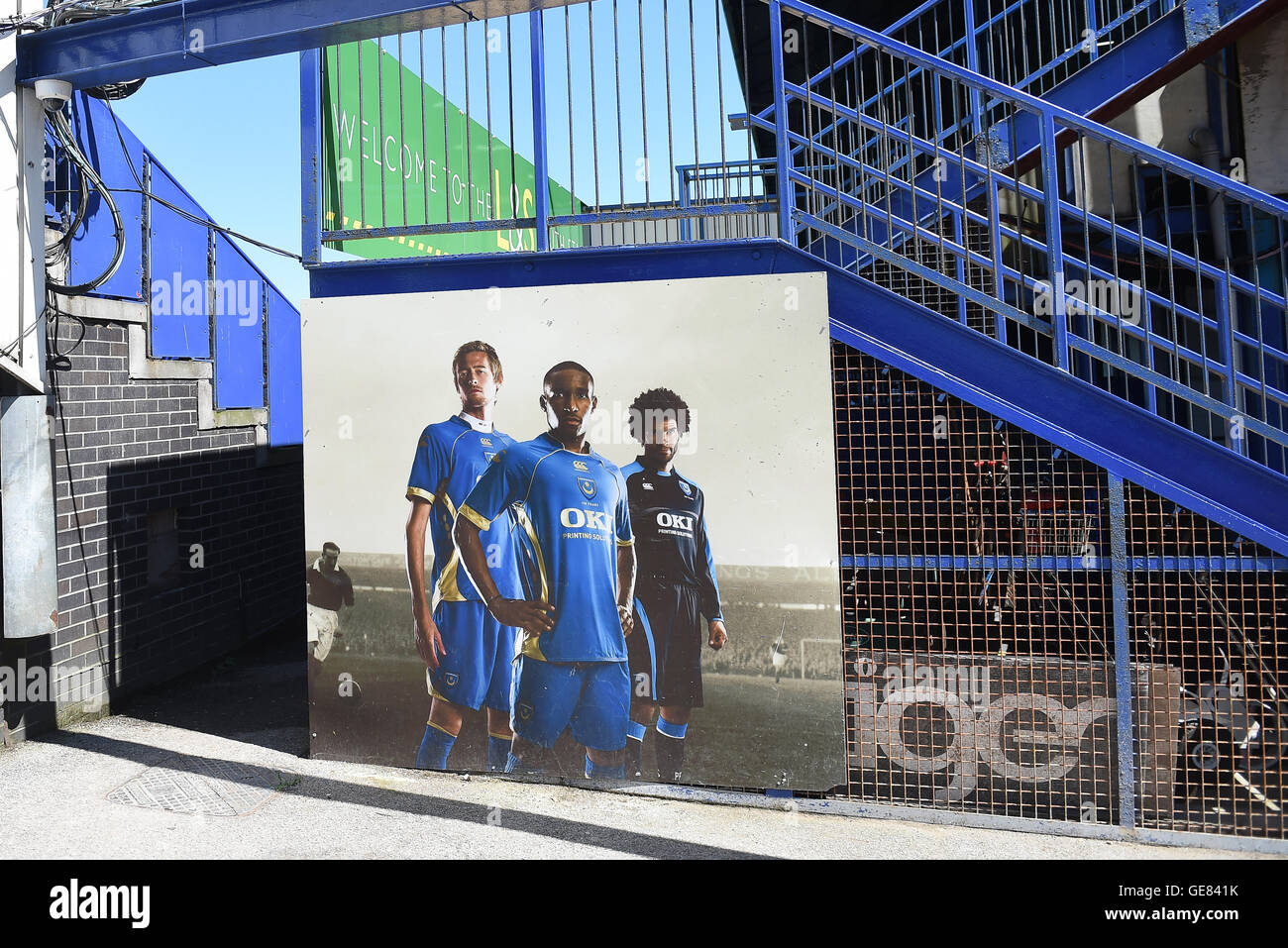 An old poster showing former players Peter Crouch, Jermain Defoe and ... An old poster showing former players Peter Crouch, Jermain Defoe and ...