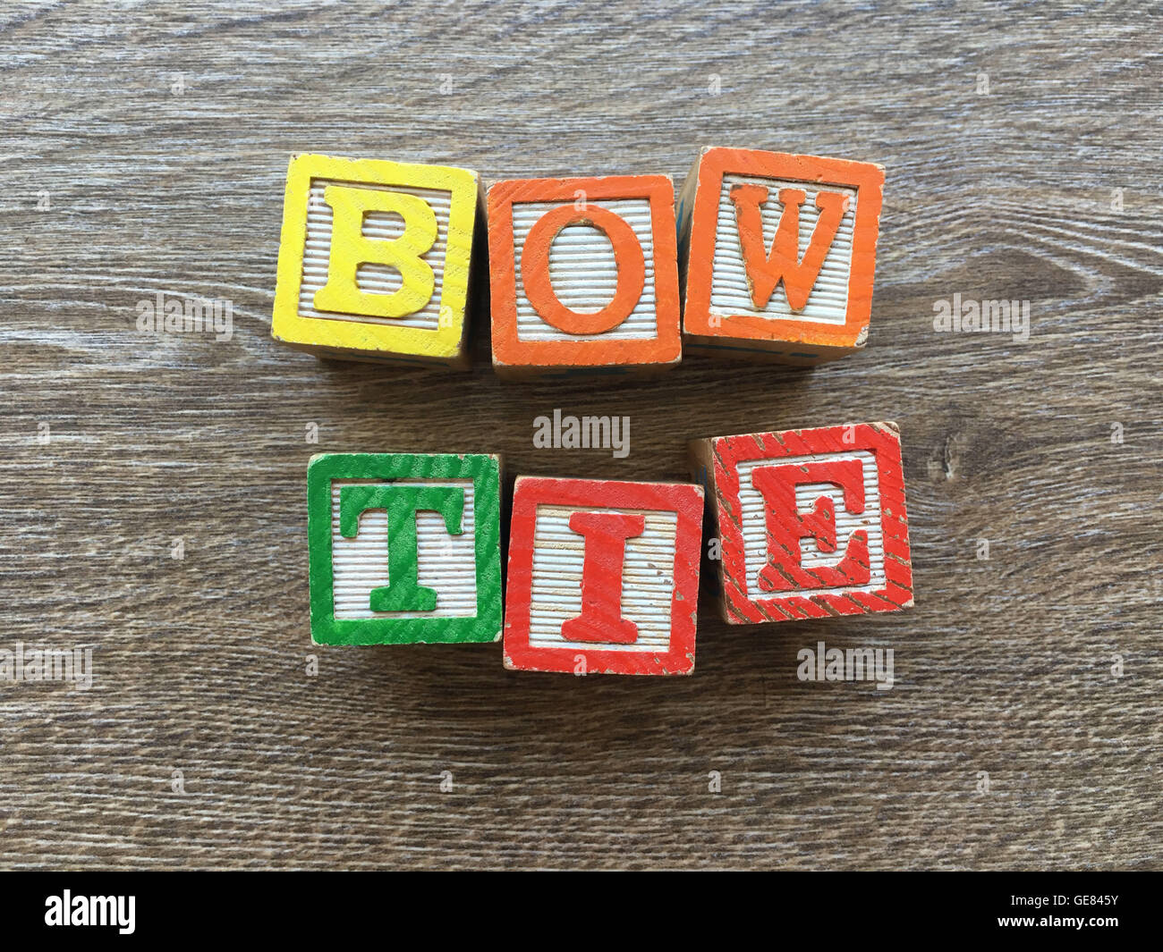 BOW TIE word written with wood block letter characters Stock Photo - Alamy