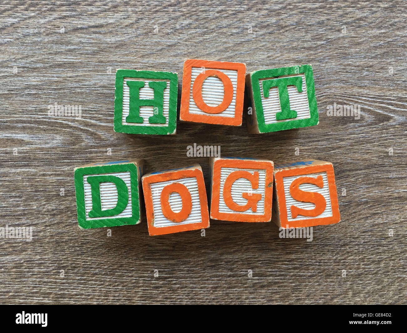 HOT DOGS sentence written with wood block letter characters Stock Photo ...