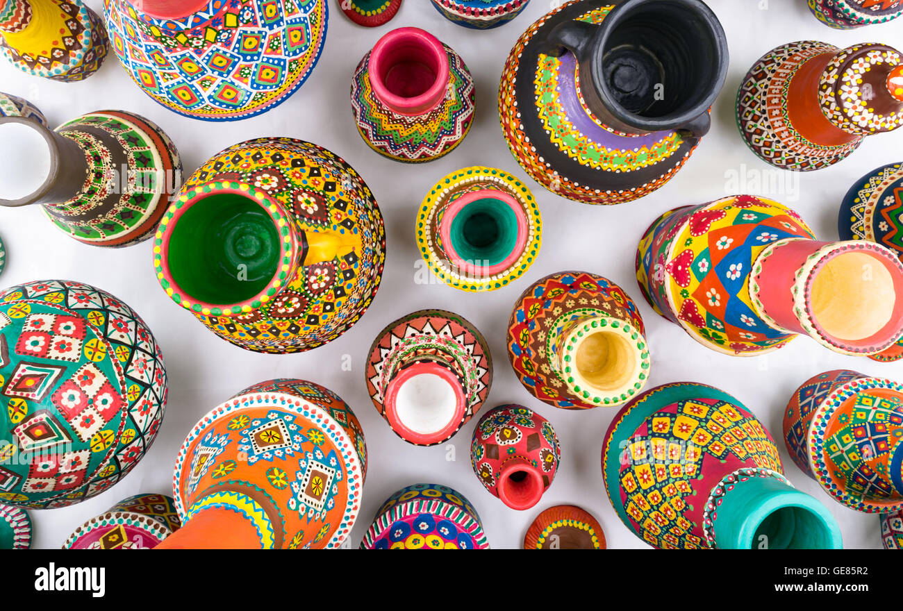 Top view showing a composition of artistic painted handcrafted pottery ...