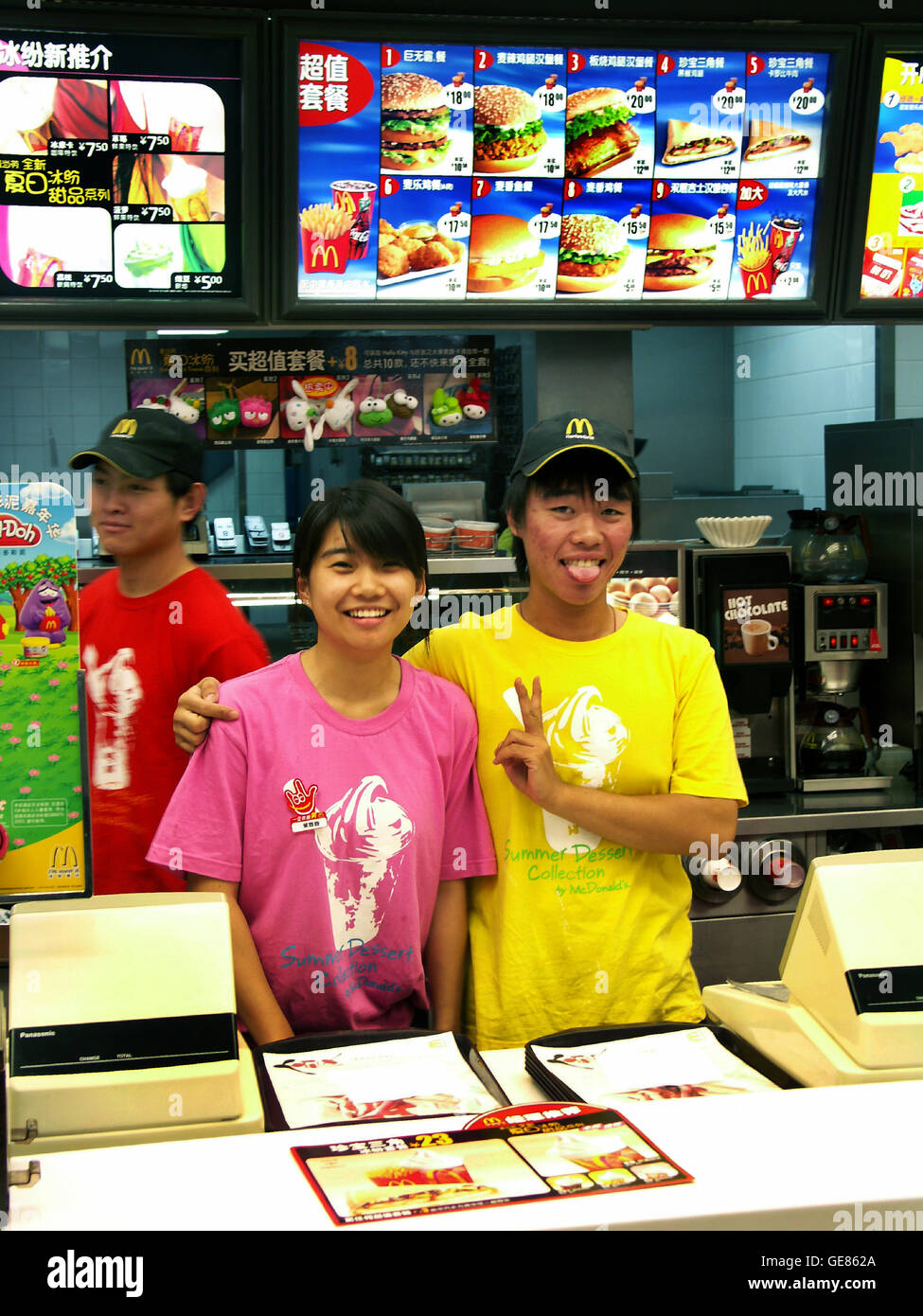 Cashiers in a MacDonalds restaurant franchise in Beijing, China Stock ...