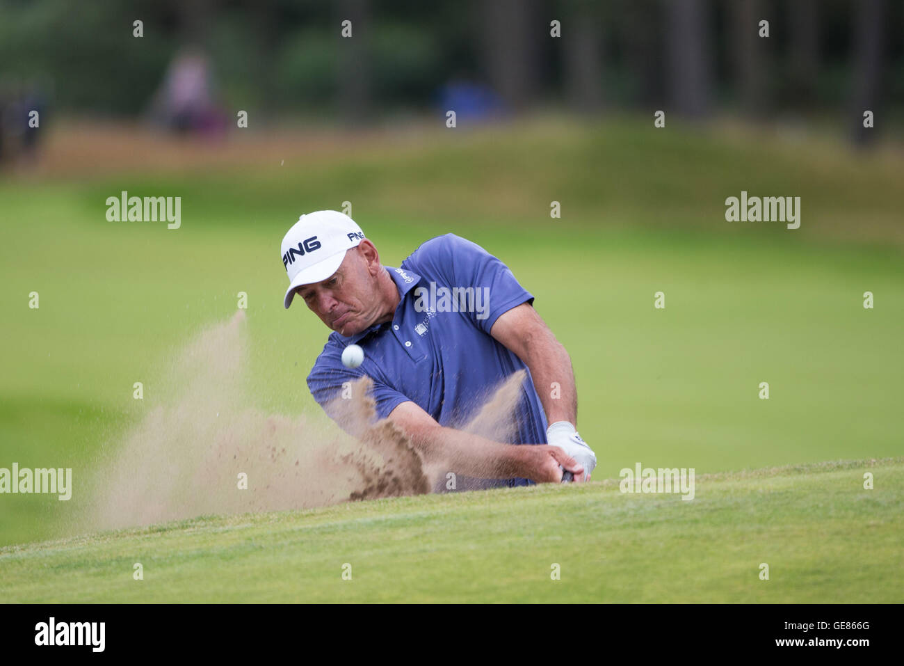 Australia's Peter fowler plays from the green side bunker at the 9th ...