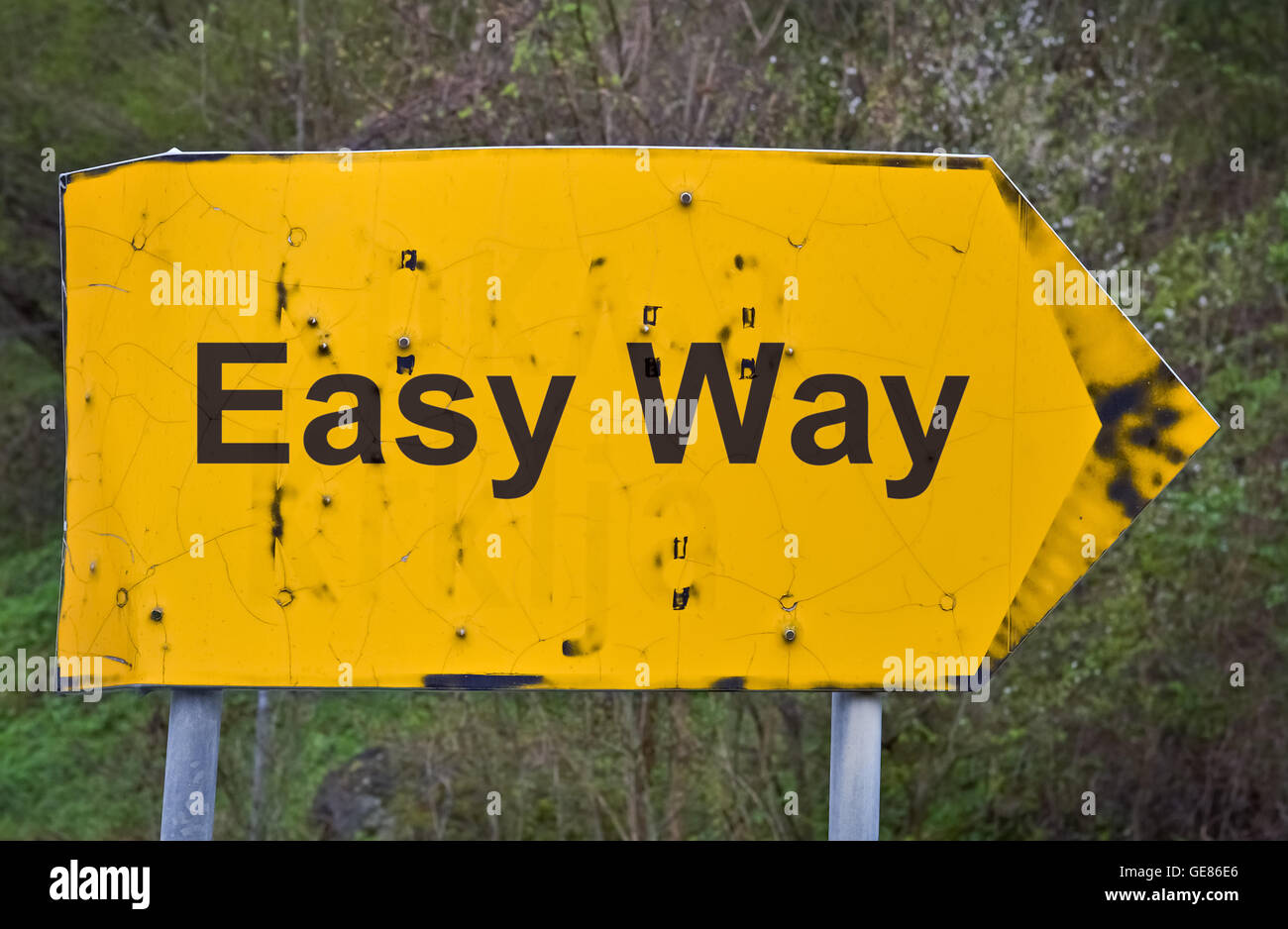 Text Easy Way written on a yellow road sign Stock Photo - Alamy
