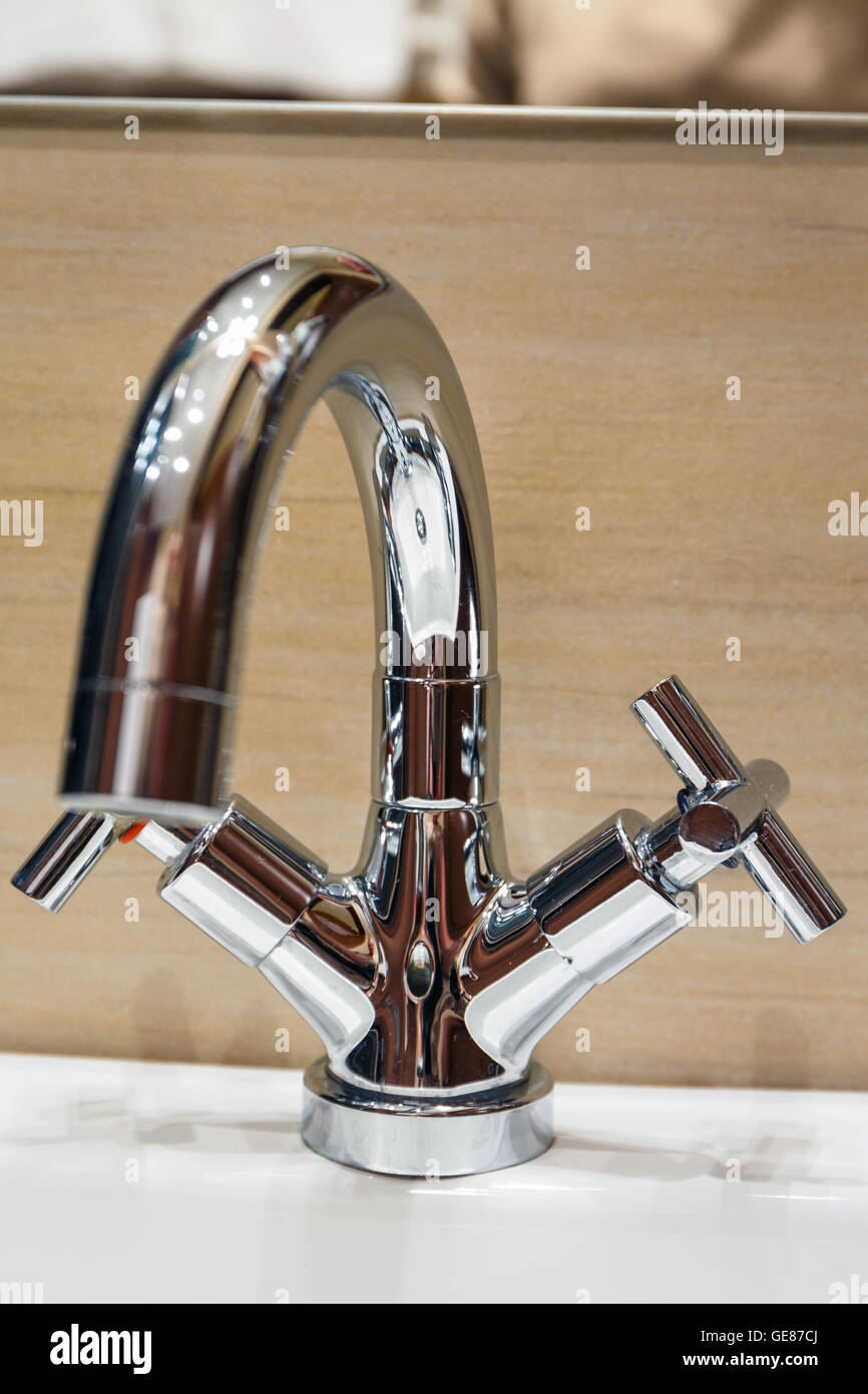 water tap with modern design in bathroom Stock Photo - Alamy