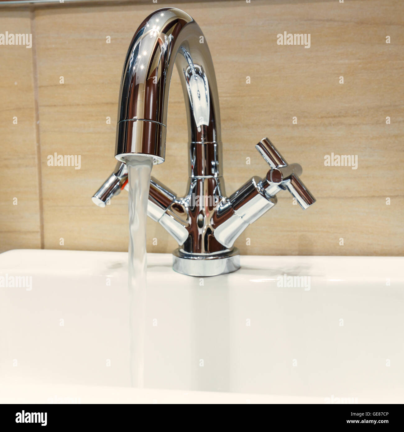 water tap with modern design in bathroom Stock Photo - Alamy