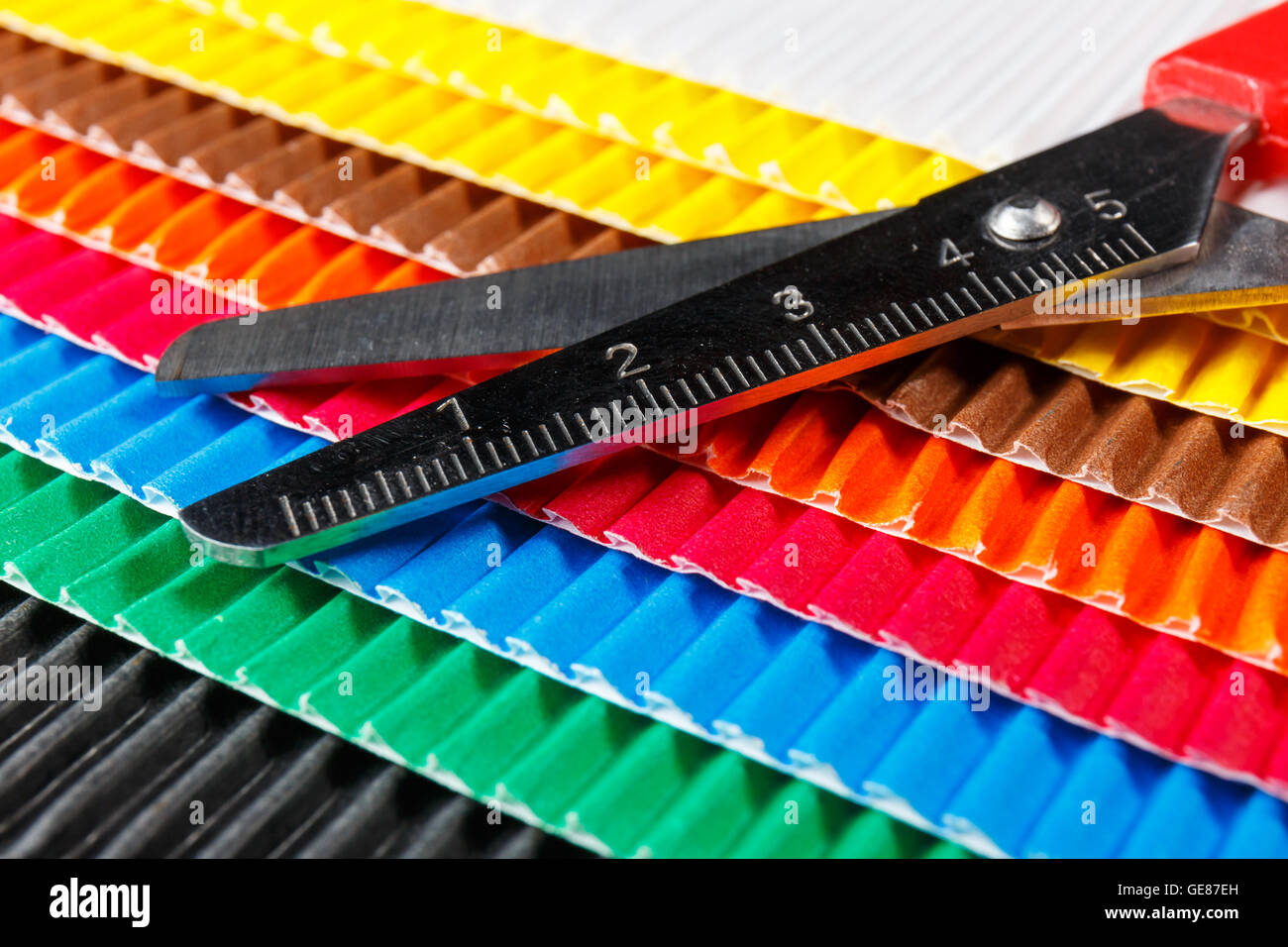 scissors on colorful cardboard Stock Photo - Alamy
