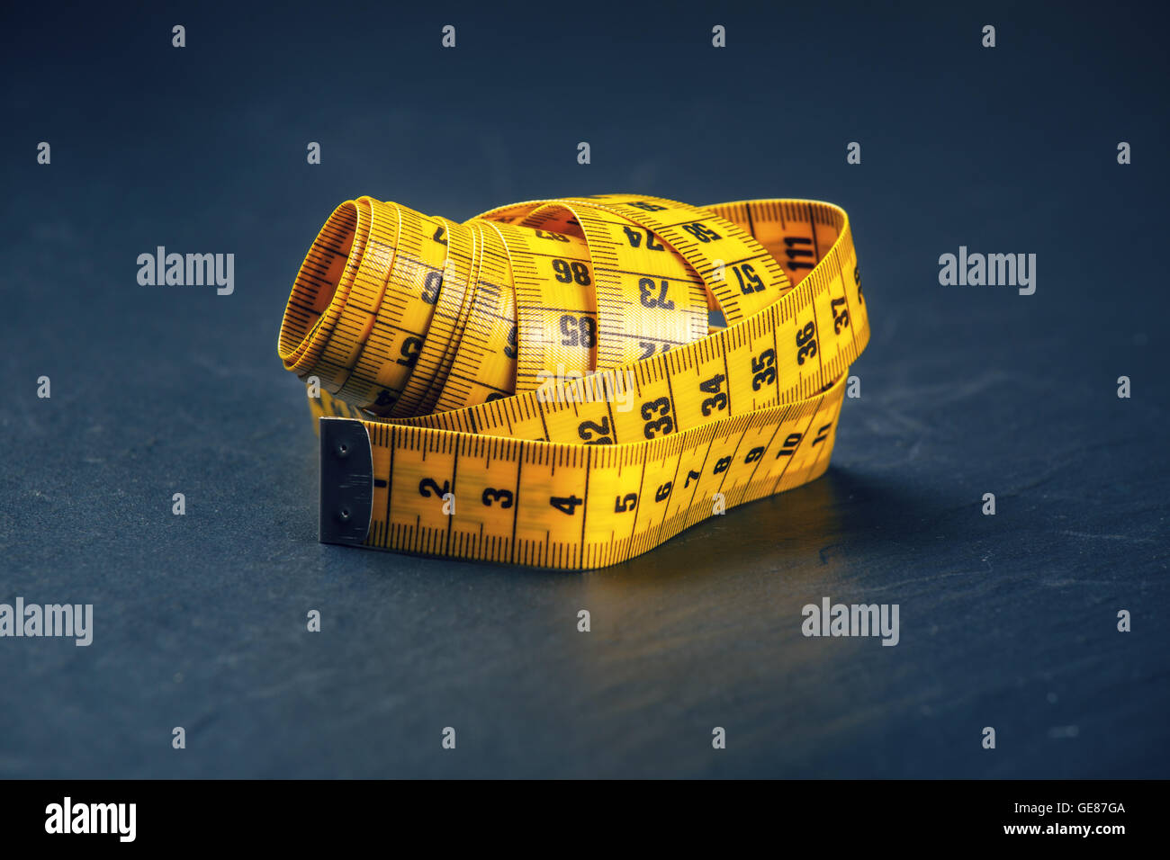 yellow measuring tape Stock Photo - Alamy