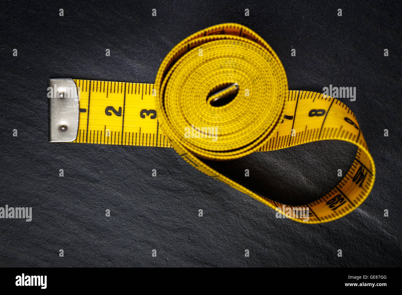 yellow measuring tape Stock Photo - Alamy