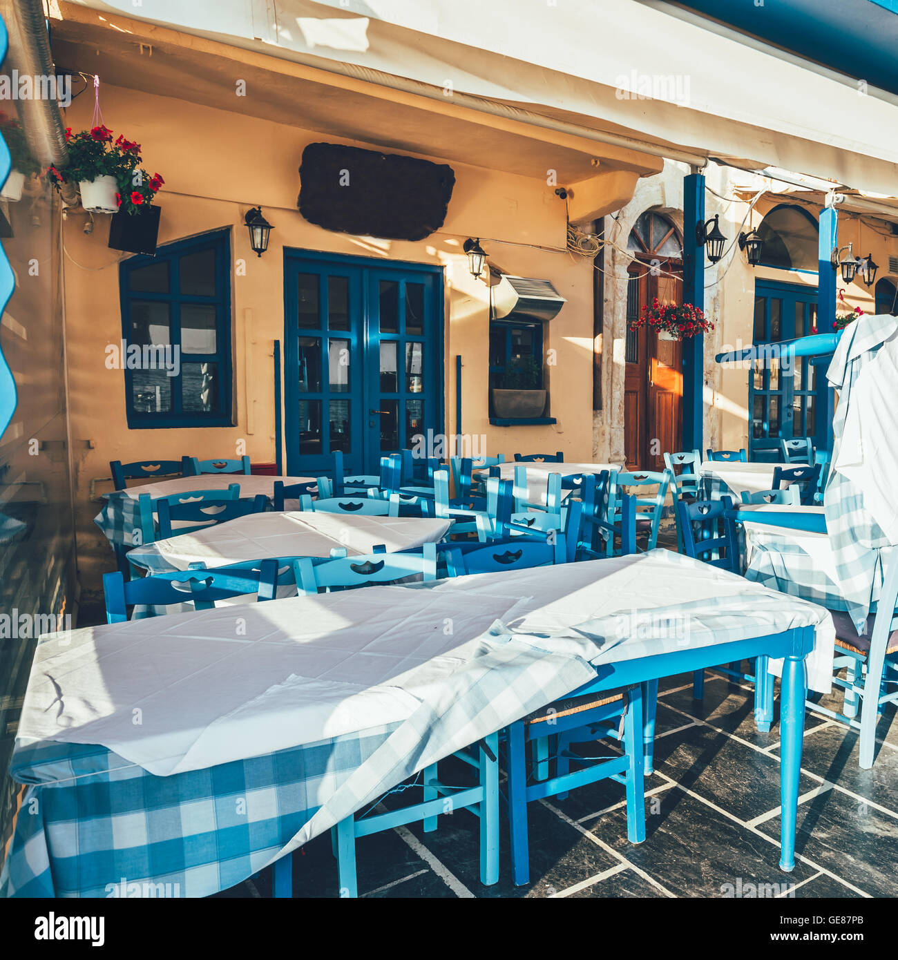 Empty greek cafe on Crete Island, Greece Stock Photo - Alamy