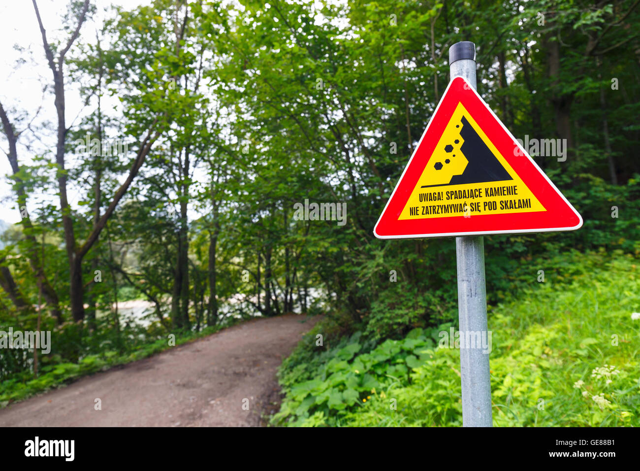Landslides road sign Stock Photo - Alamy