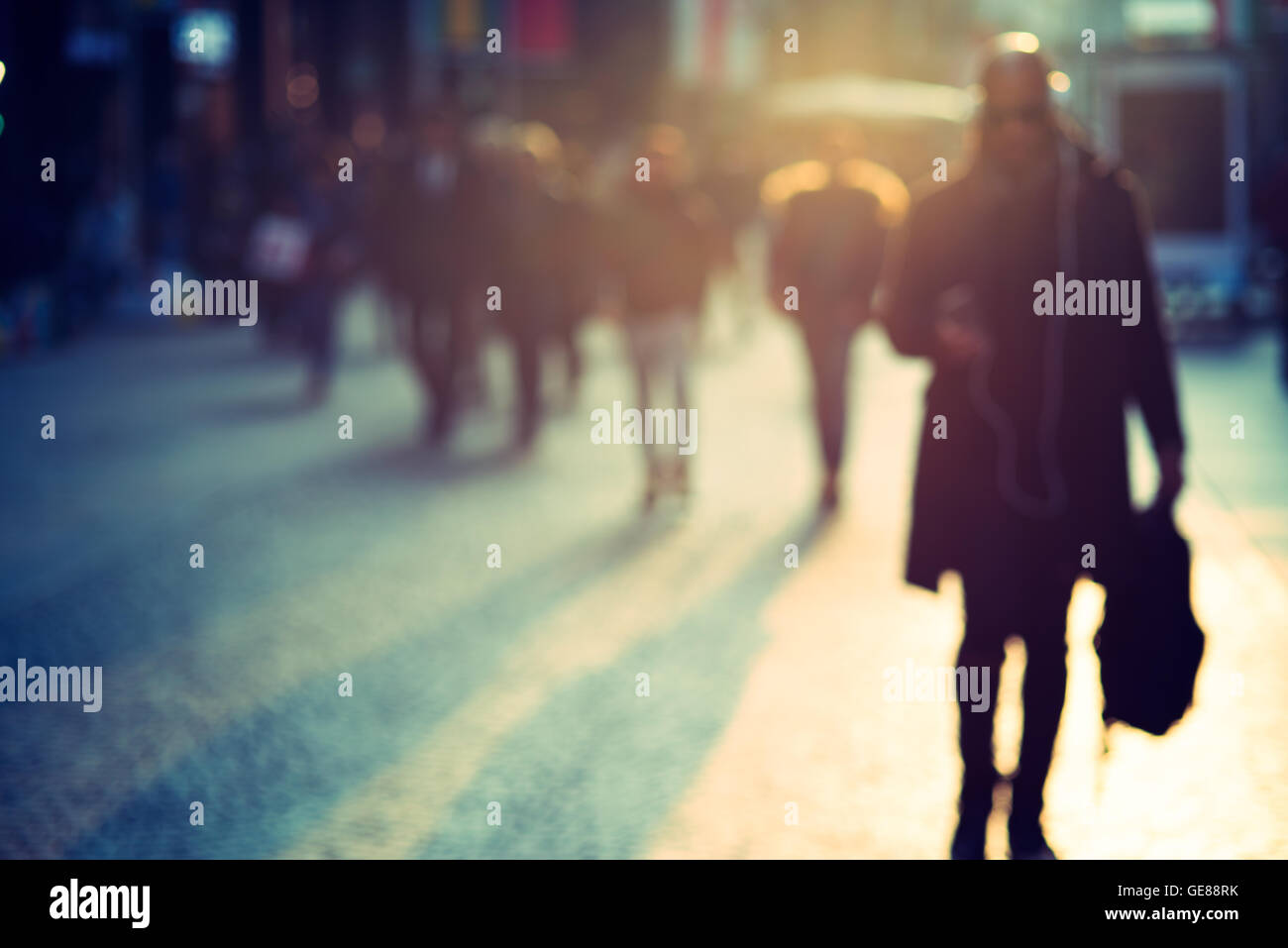 people walking in the street using mobile phone Stock Photo - Alamy