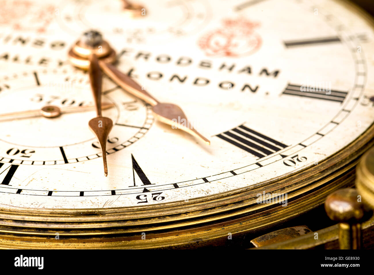 pointers of antique marine chronometer reaching twelve Stock Photo - Alamy