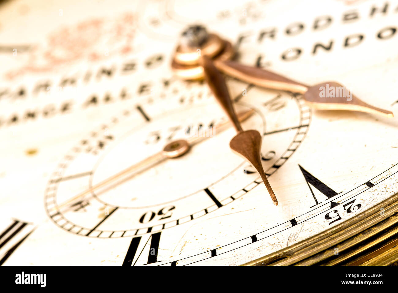 pointers of antique marine chronometer reaching twelve Stock Photo - Alamy