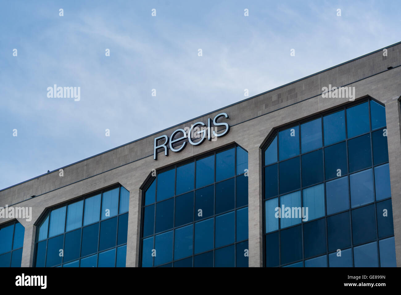 Regis Corporate Headquarters Sign Stock Photo - Alamy