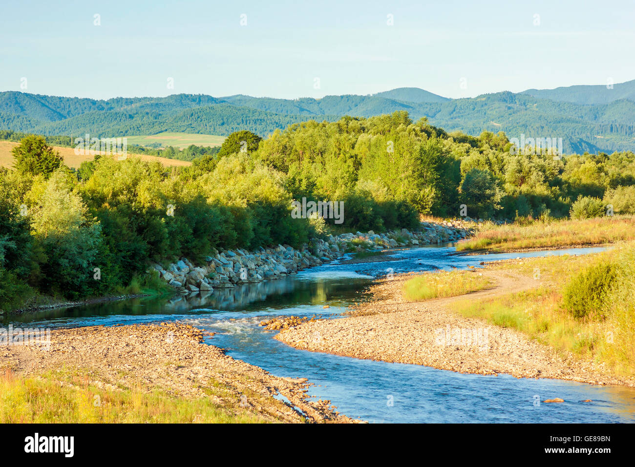 Clear blue river in mountains Stock Photo - Alamy