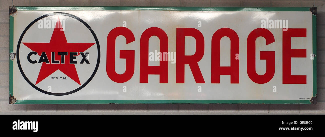 This enamel advertising sign from Caltex Garage, a well-known global ...