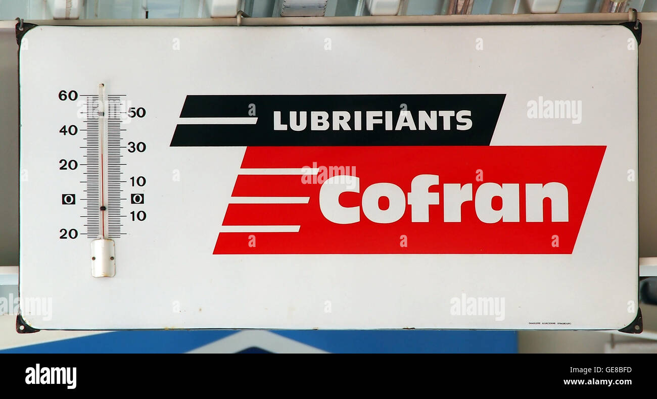 This enamel advertising sign features the brand Cofran lubricants ...