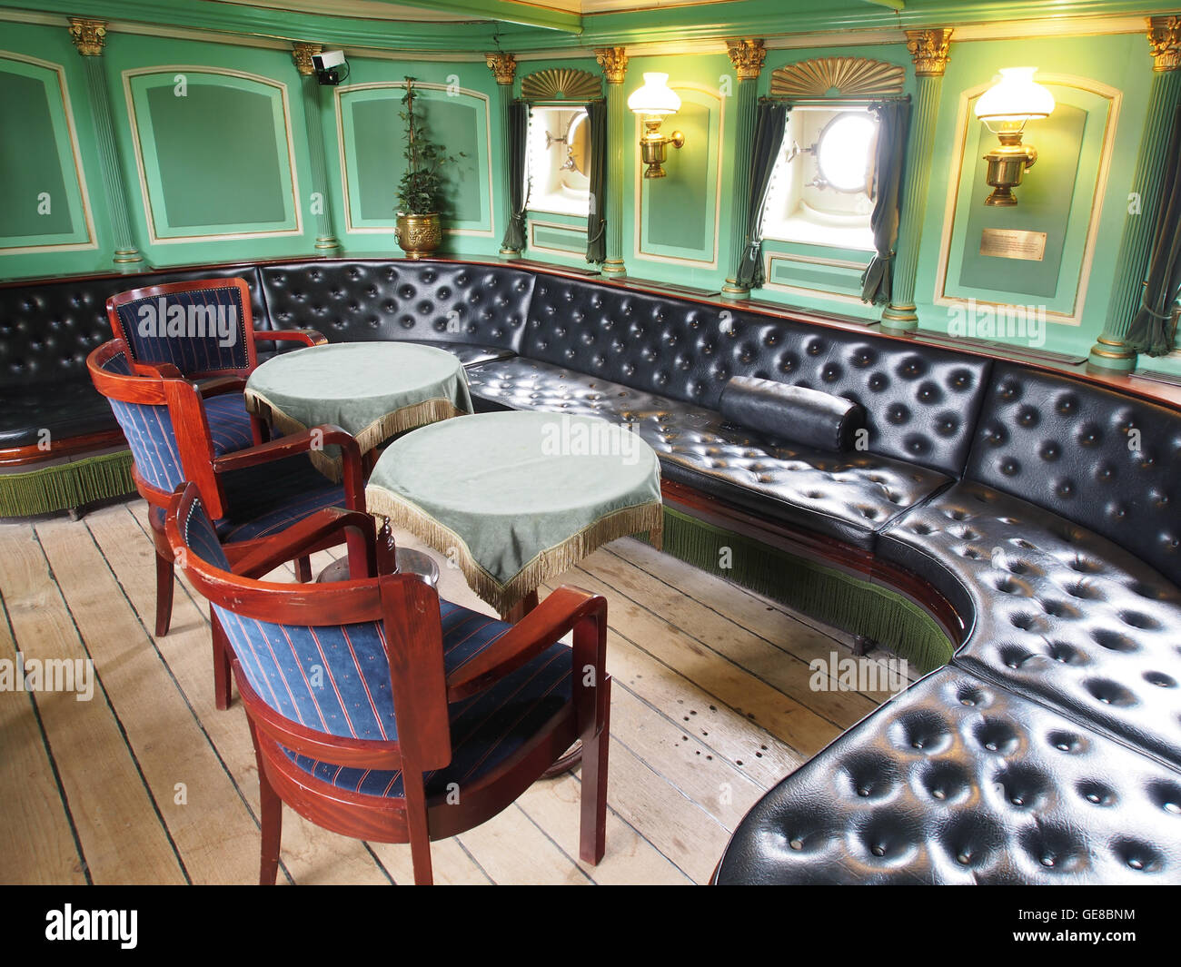 This photograph showcases the officers' quarters aboard 'De Buffel,' a ...