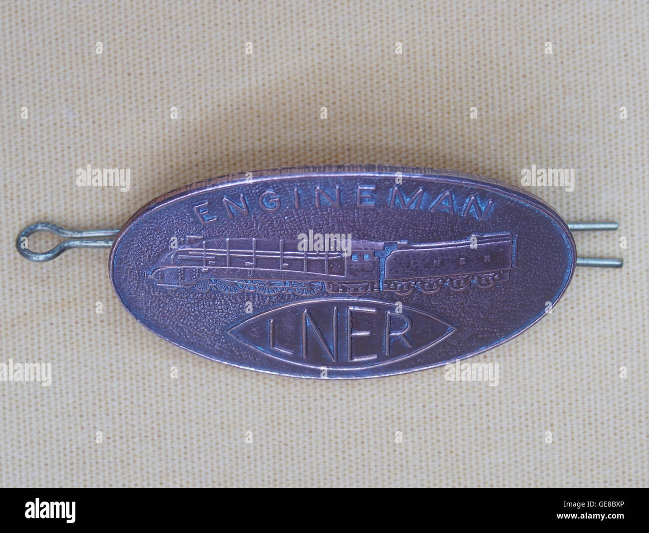 This image showcases an Engineman's pin from the London and North ...