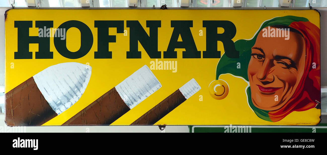 This enamel advertising sign features the Hofnar brand, showcasing ...