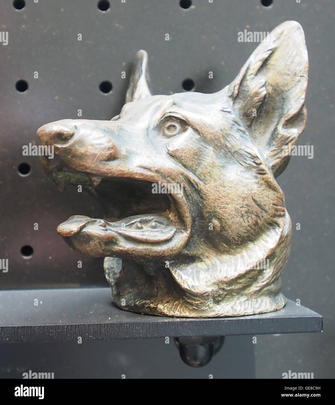 The hood ornament shown in this photo belongs to a Citroën automobile ...