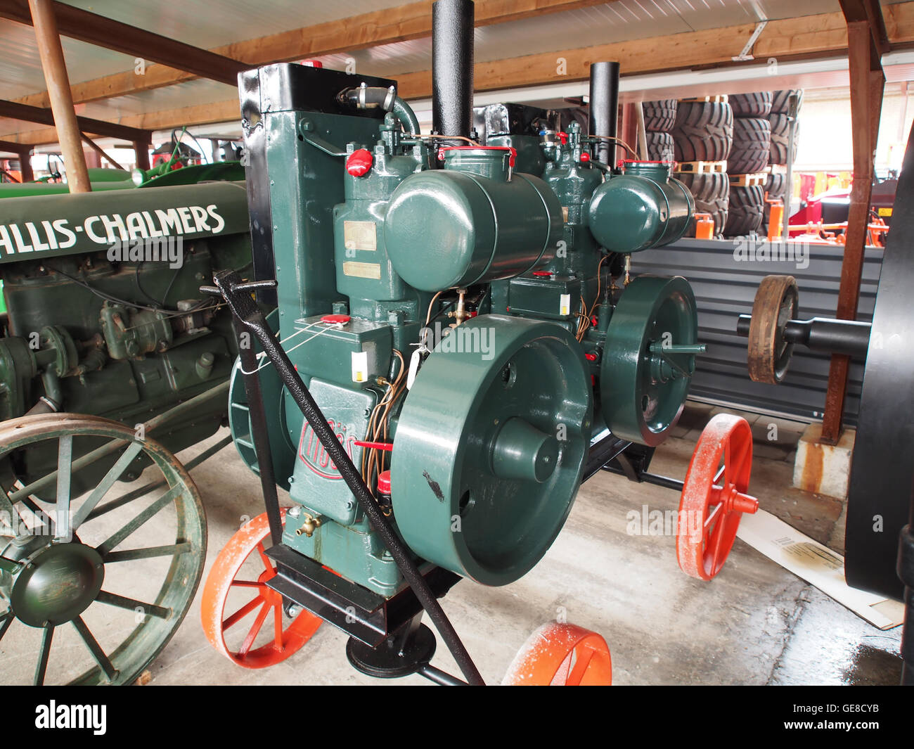 This photograph shows a stationary diesel engine, specifically a ...