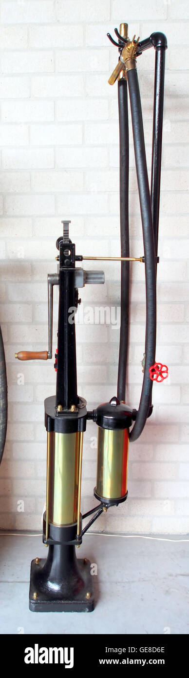 This image shows an old petrol pump displayed at the Museum for ...