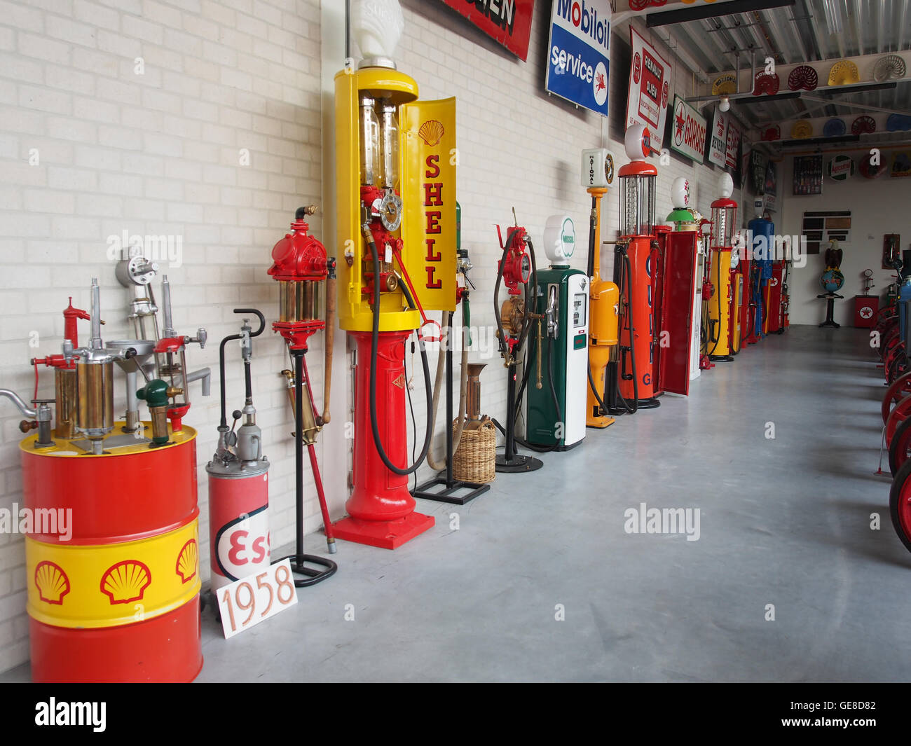 This image captures old gasoline pumps on display at a museum ...