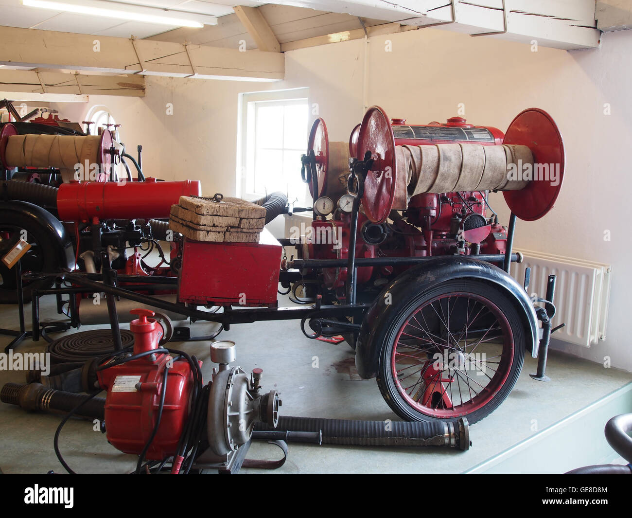 This image depicts an antique fire truck from the Netherlands, known as ...